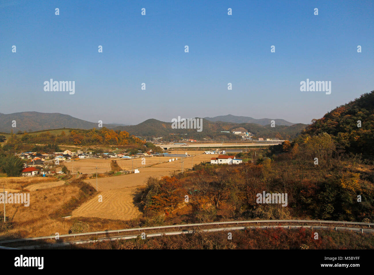 Aerial view of South Korea countryside and crop field in autumn through ...