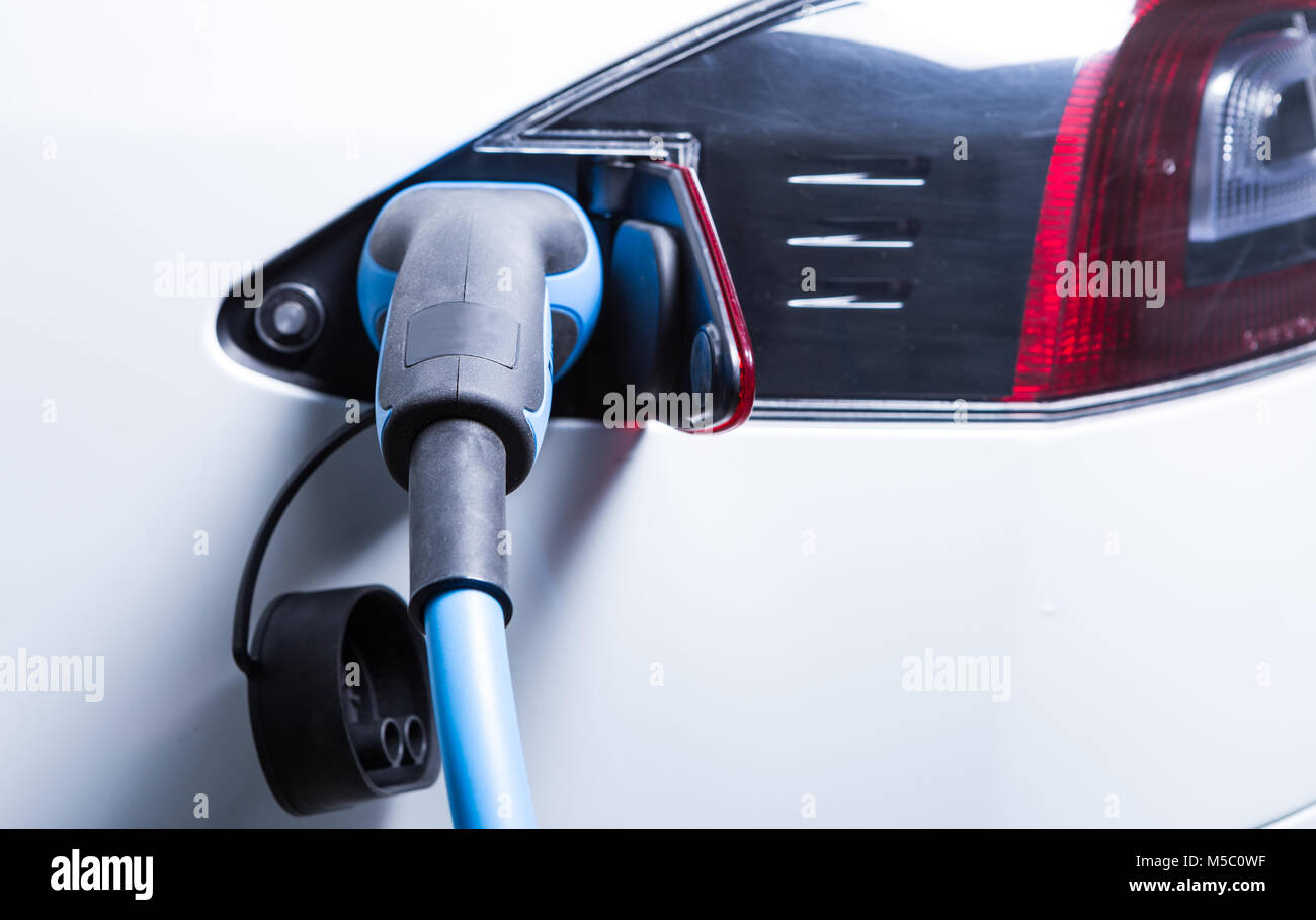 Electric Cars Tesla Plugged In