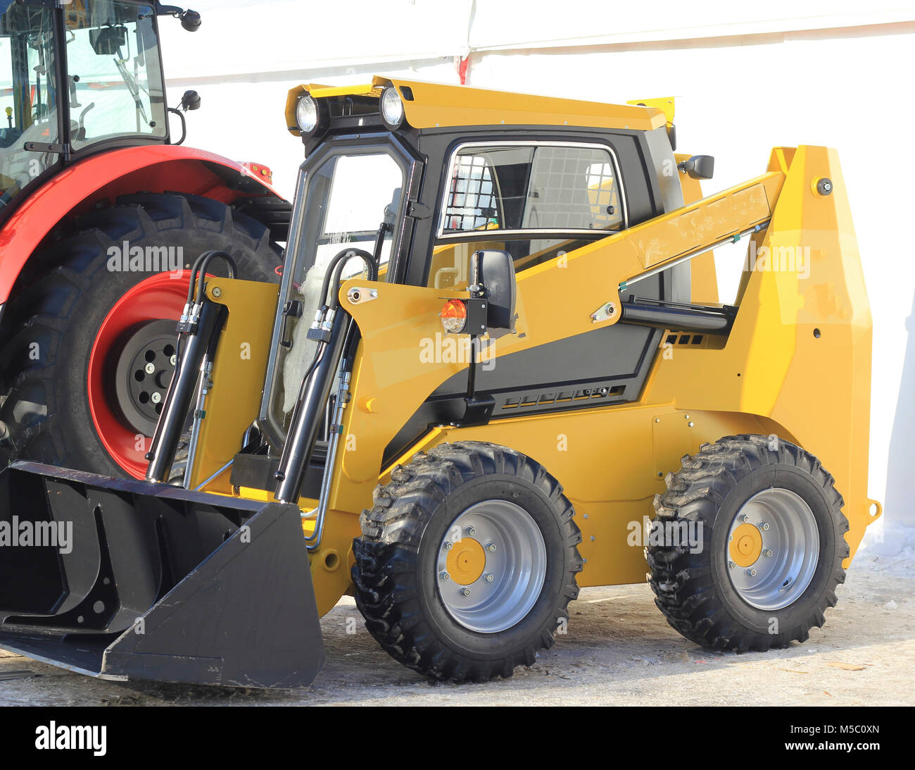 Agricultural machinery, front loader at the exhibition Stock Photo - Alamy