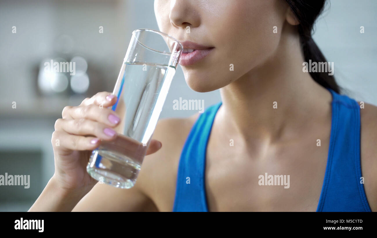 Sports Girl Drinking Crystal Clear Water Restoring Aqua Balance After