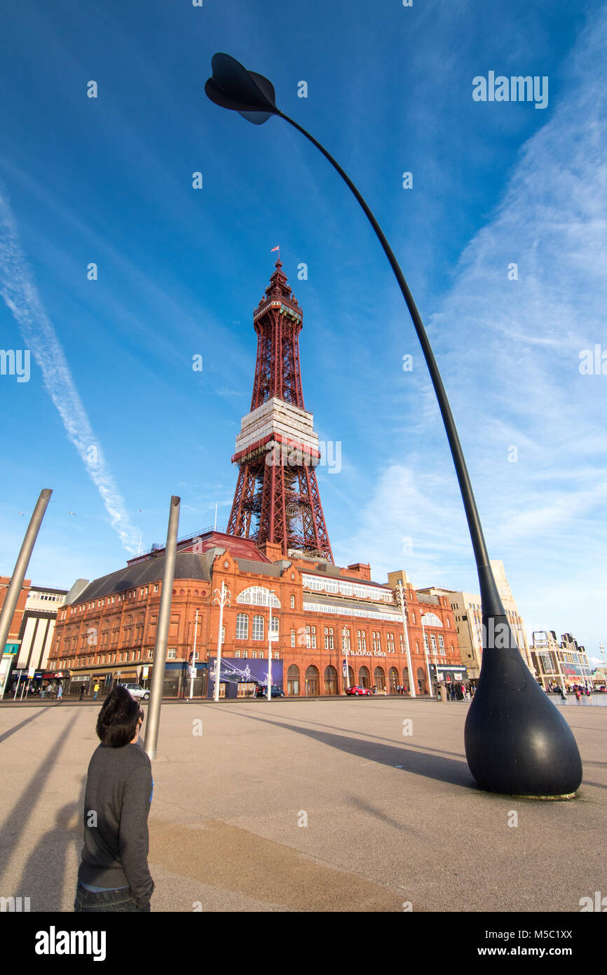 Blackpool, England, UK - August 1, 2015: A man looks up at the iconic ...