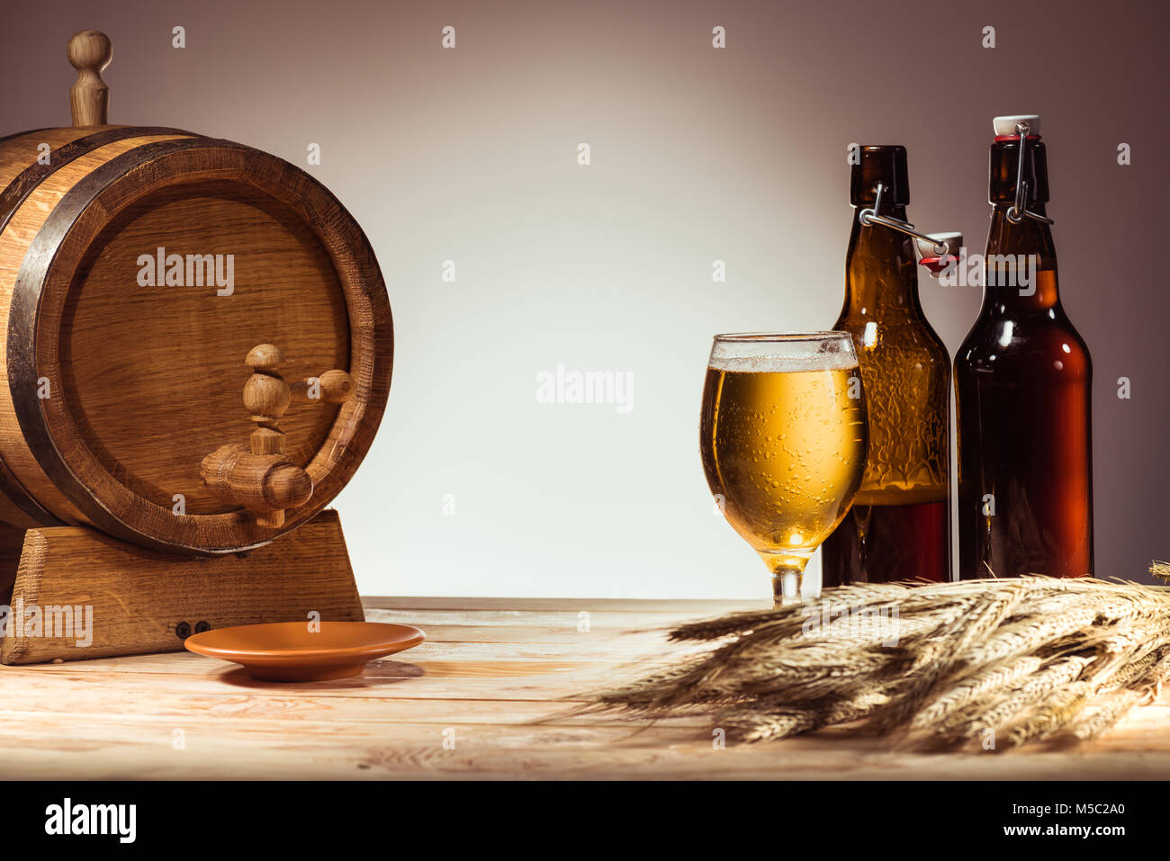 beer barrel, glass and bottles Stock Photo - Alamy