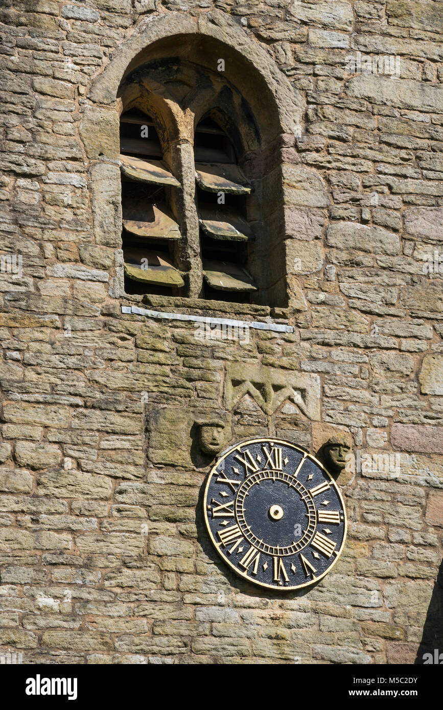 Clock face and window on the tower of St James' church, Taxal, Whaley ...