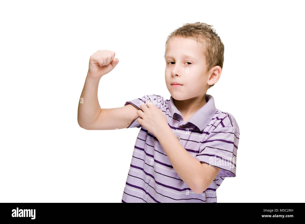Frontal Torso view of an 8-year-old boy in front of white background ...