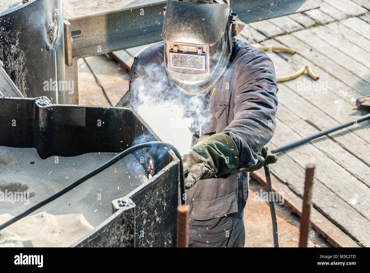 Construction worker welding on site hi-res stock photography and images ...