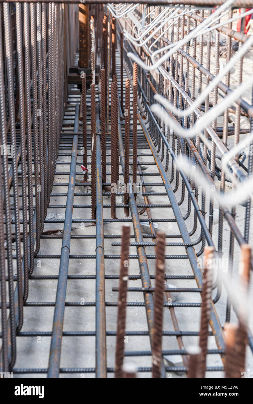 concrete braiding in a row with concrete floor Stock Photo - Alamy