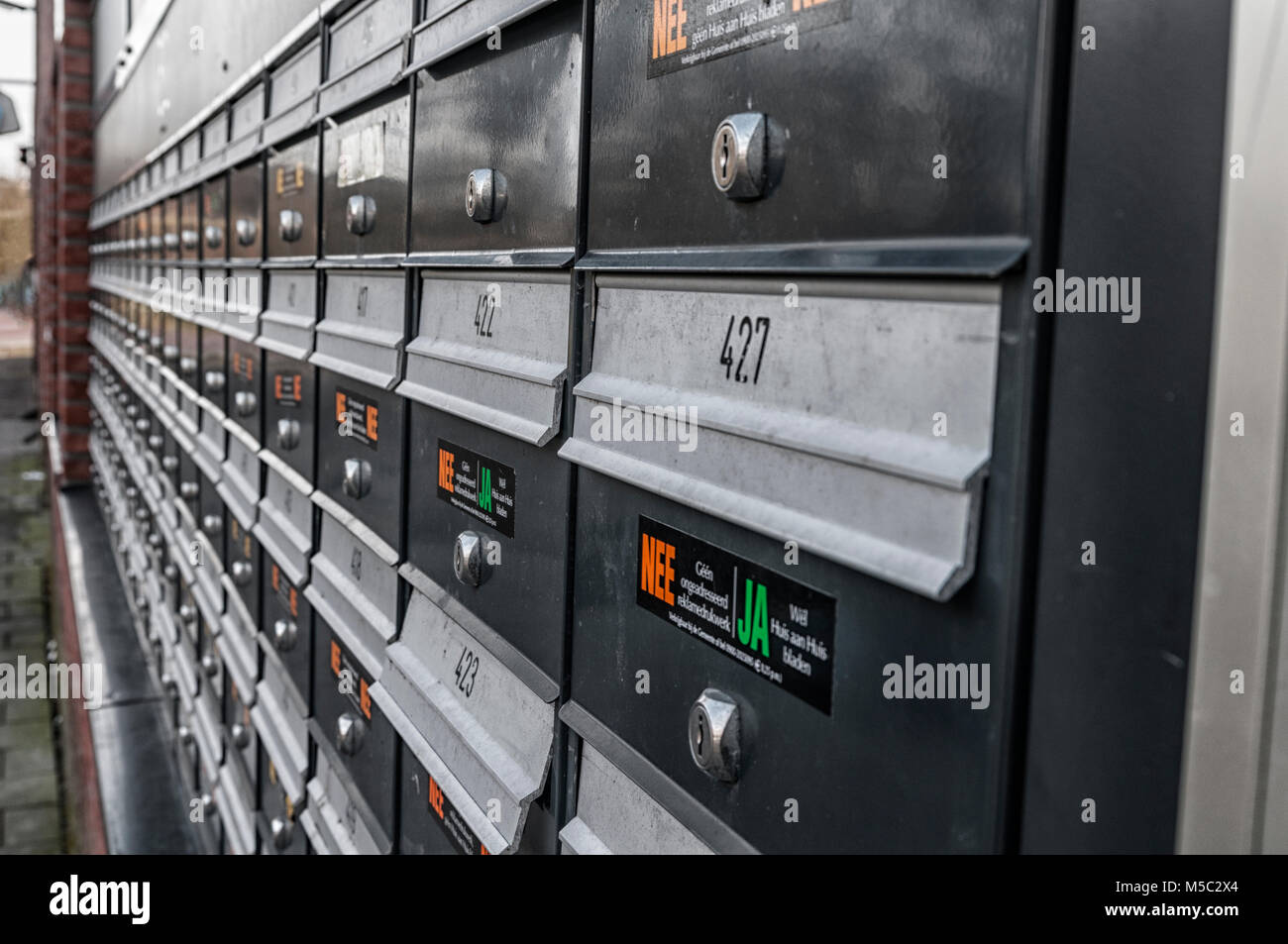Mailboxes in a row hi-res stock photography and images - Alamy