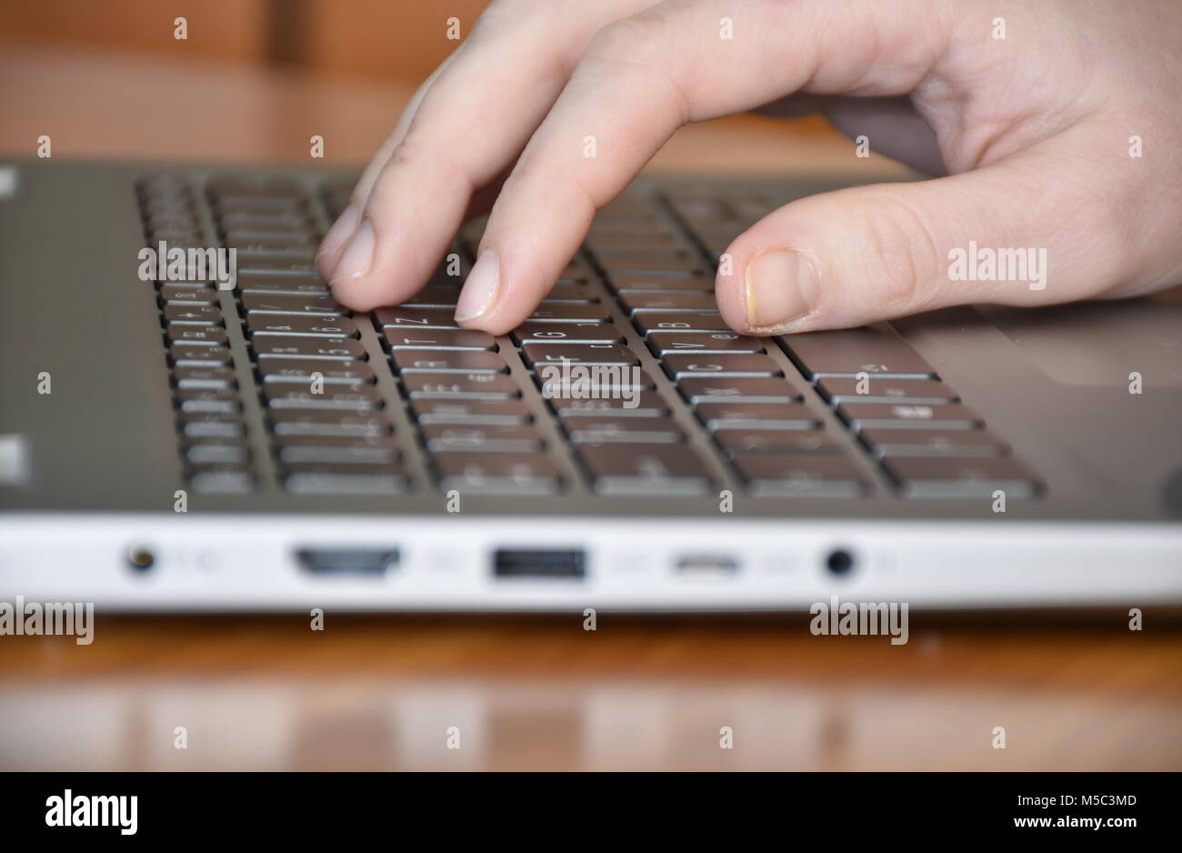 Writing on the laptop keyboard Stock Photo - Alamy