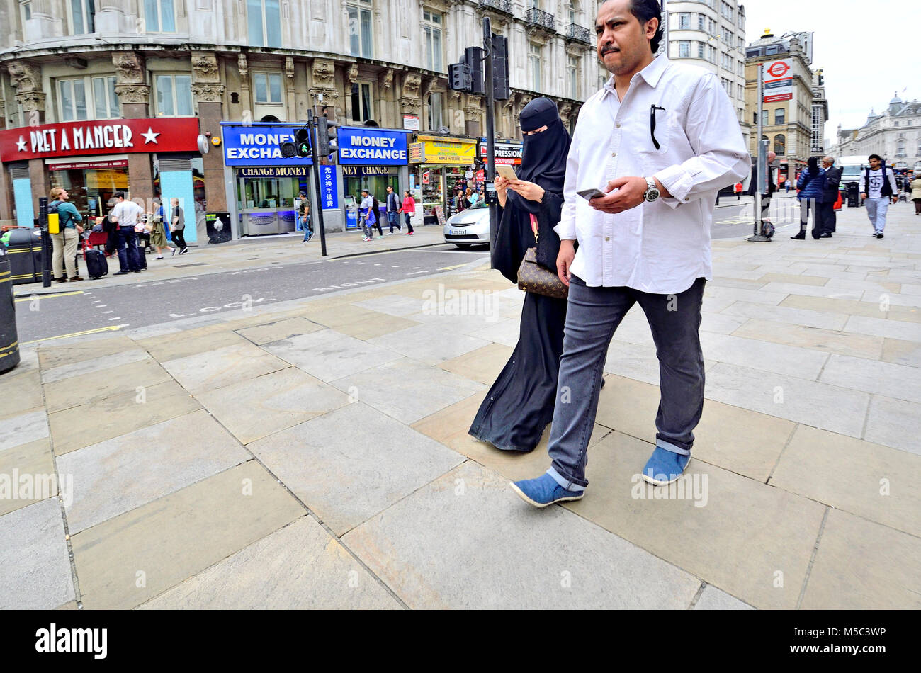 Muslim man mobile phone in hi-res stock photography and images - Alamy