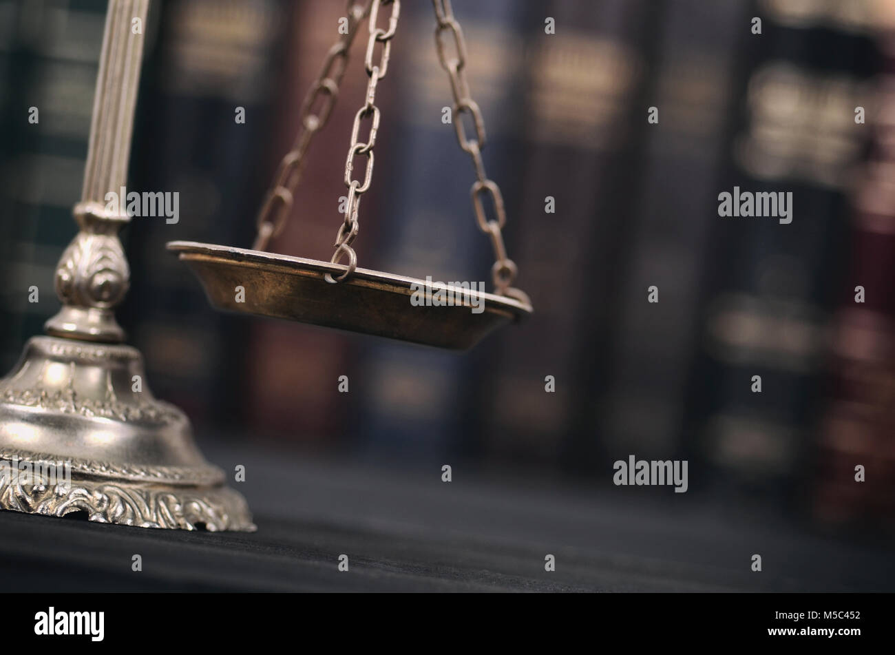 Law and Justice, Legality concept, Scales of Justice on a black wooden ...
