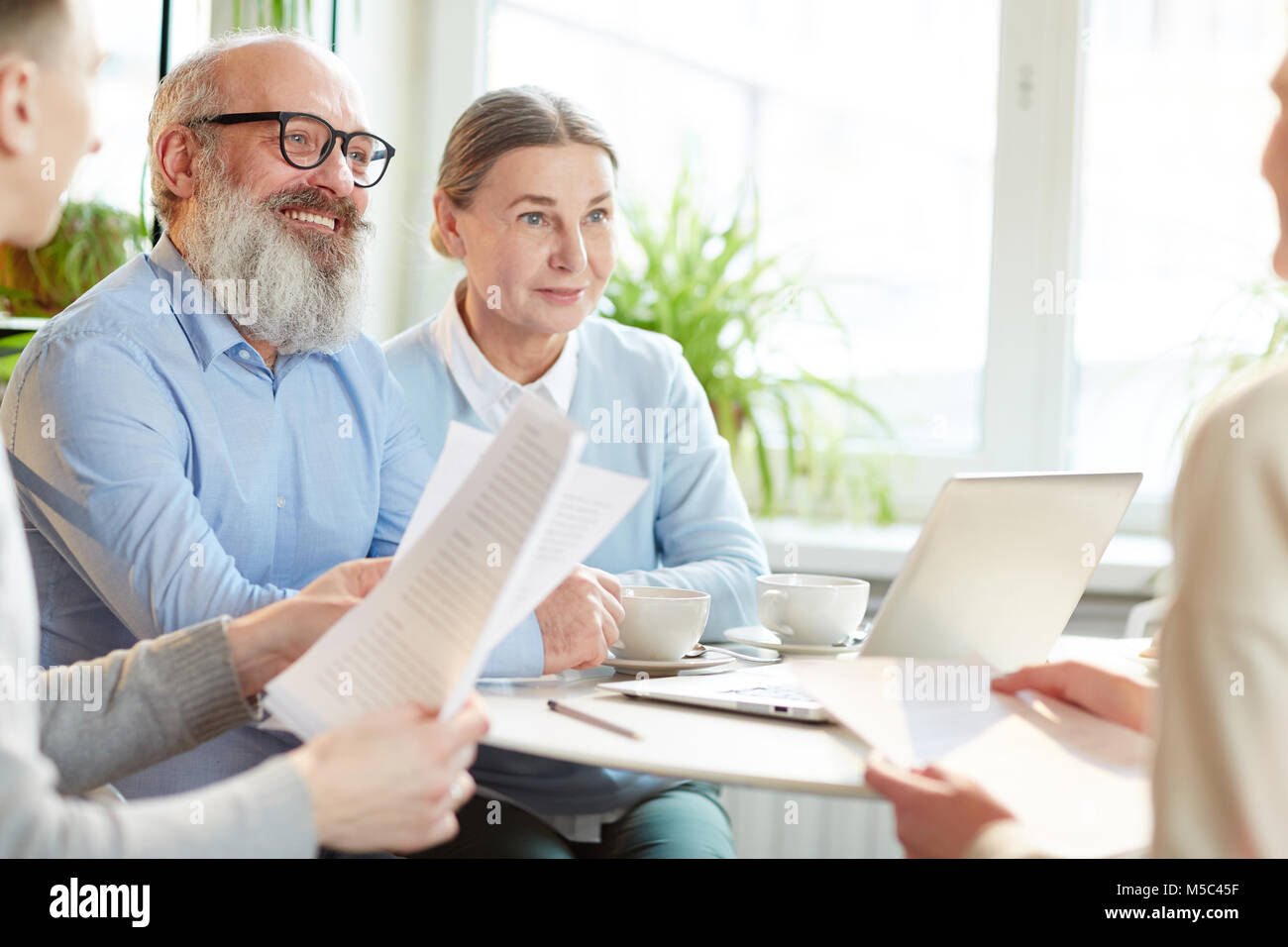Discussion with colleagues Stock Photo - Alamy
