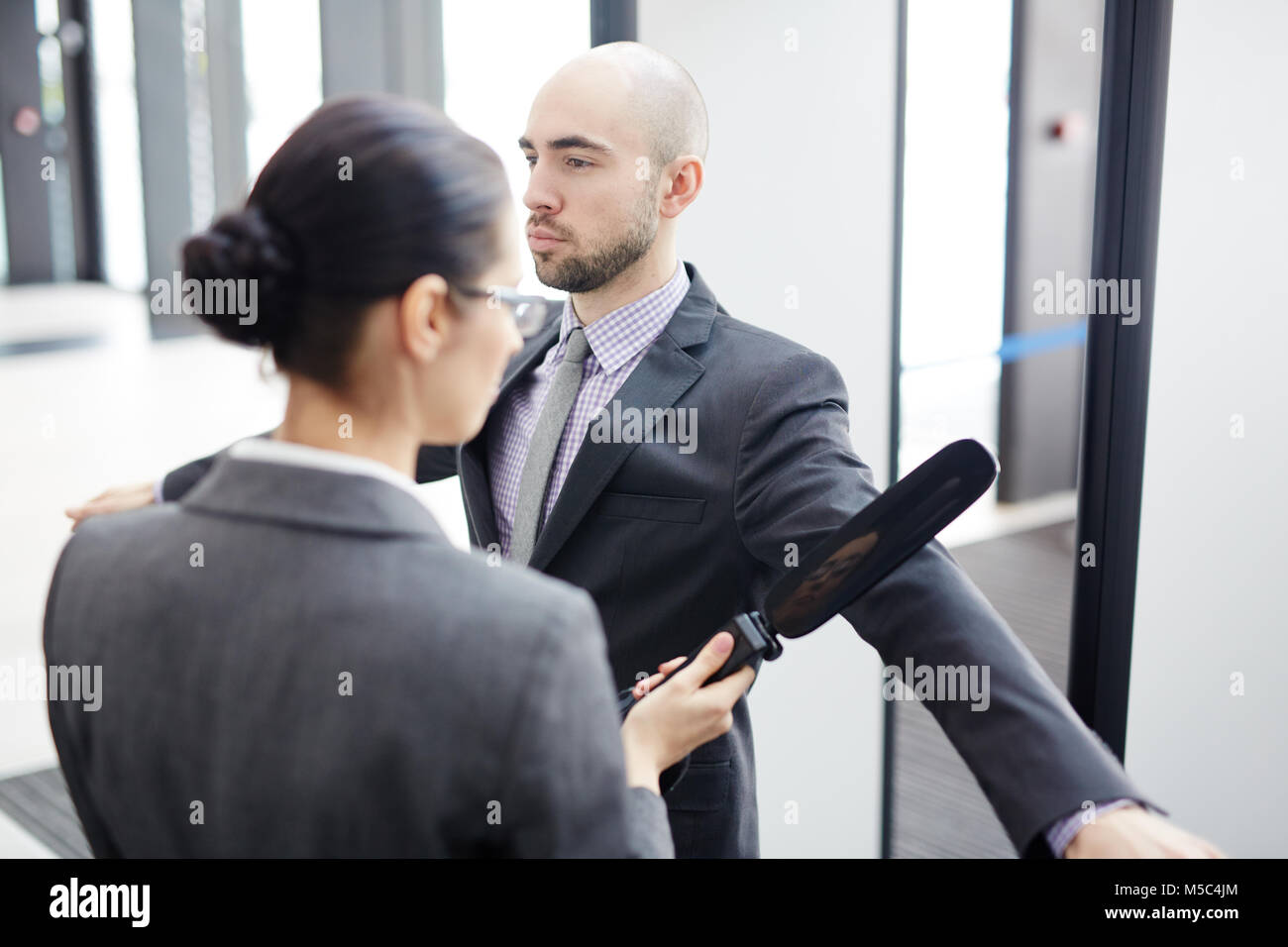 Airport security screening woman hi-res stock photography and images ...