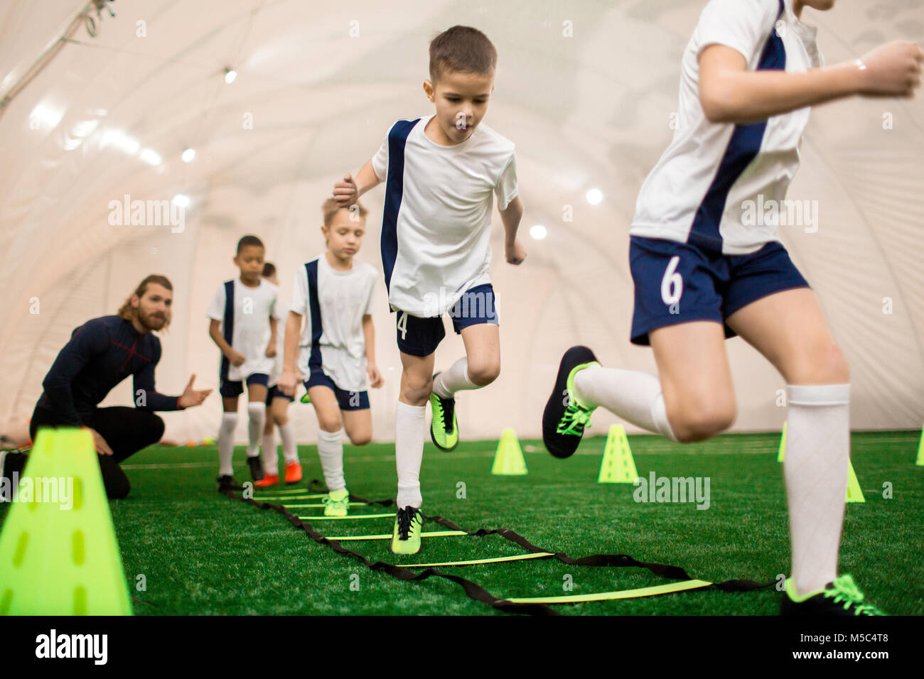 Training coach indoor stadium hi-res stock photography and images - Alamy