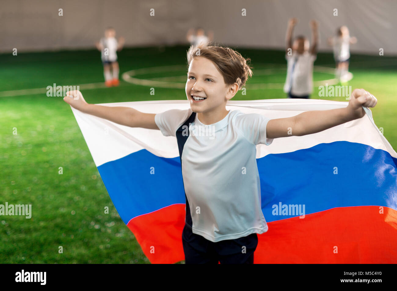 Boy with flag Stock Photo - Alamy