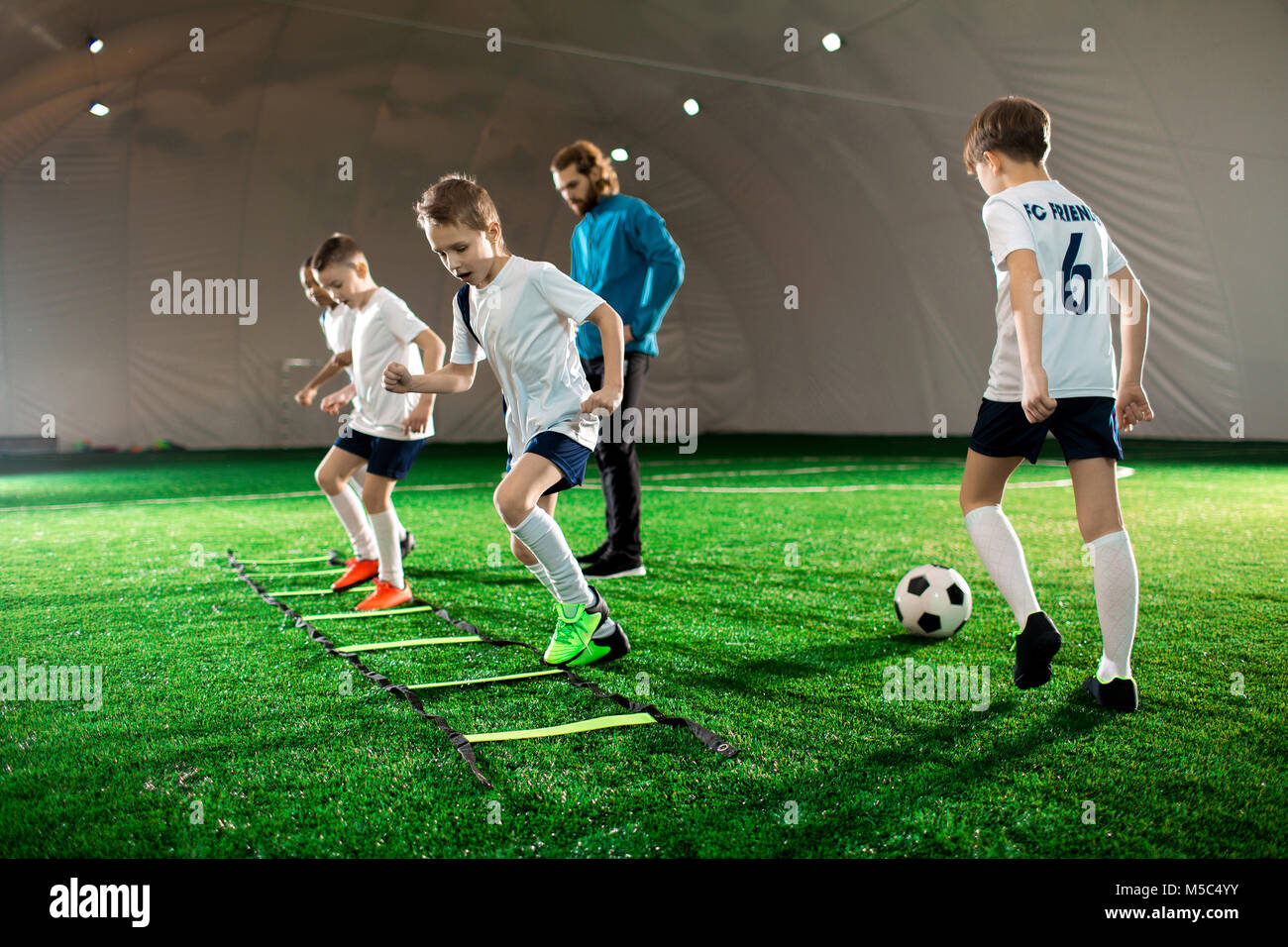 Boys exercising hi-res stock photography and images - Alamy