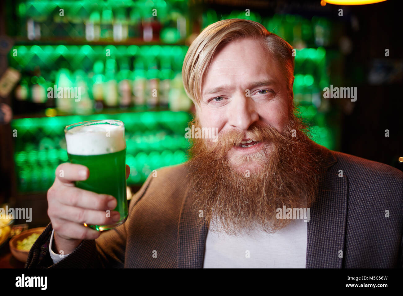 Young man beer bar hi-res stock photography and images - Alamy