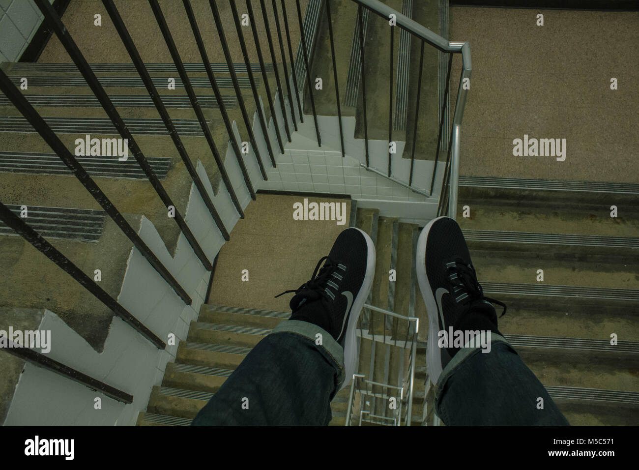 Feet stairs indoors hi-res stock photography and images - Alamy
