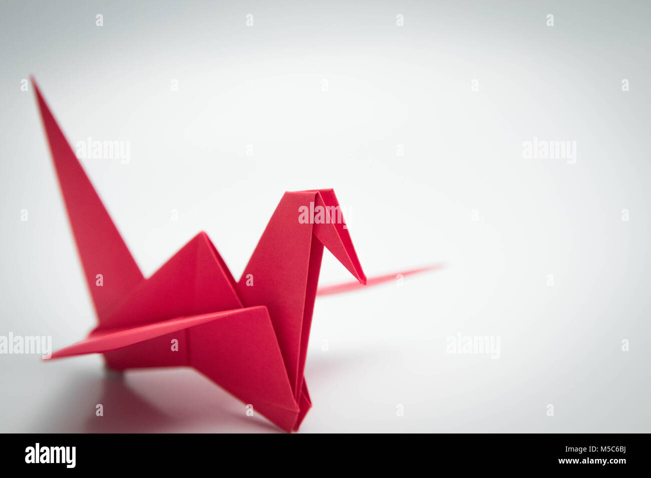 Red bird origami hi-res stock photography and images - Alamy