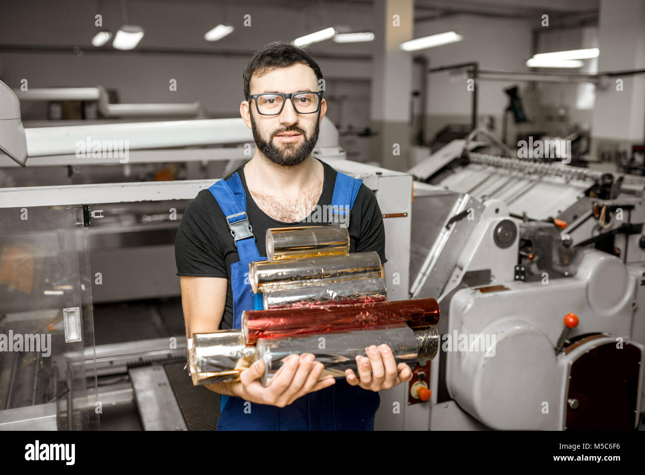 Worker working on stamping hi-res stock photography and images - Alamy