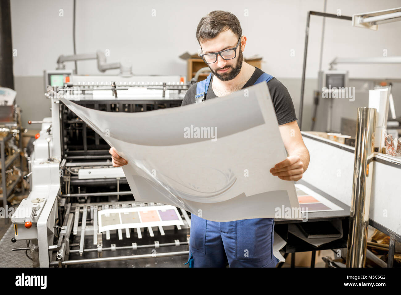 Printer checking print machine hi-res stock photography and images - Alamy