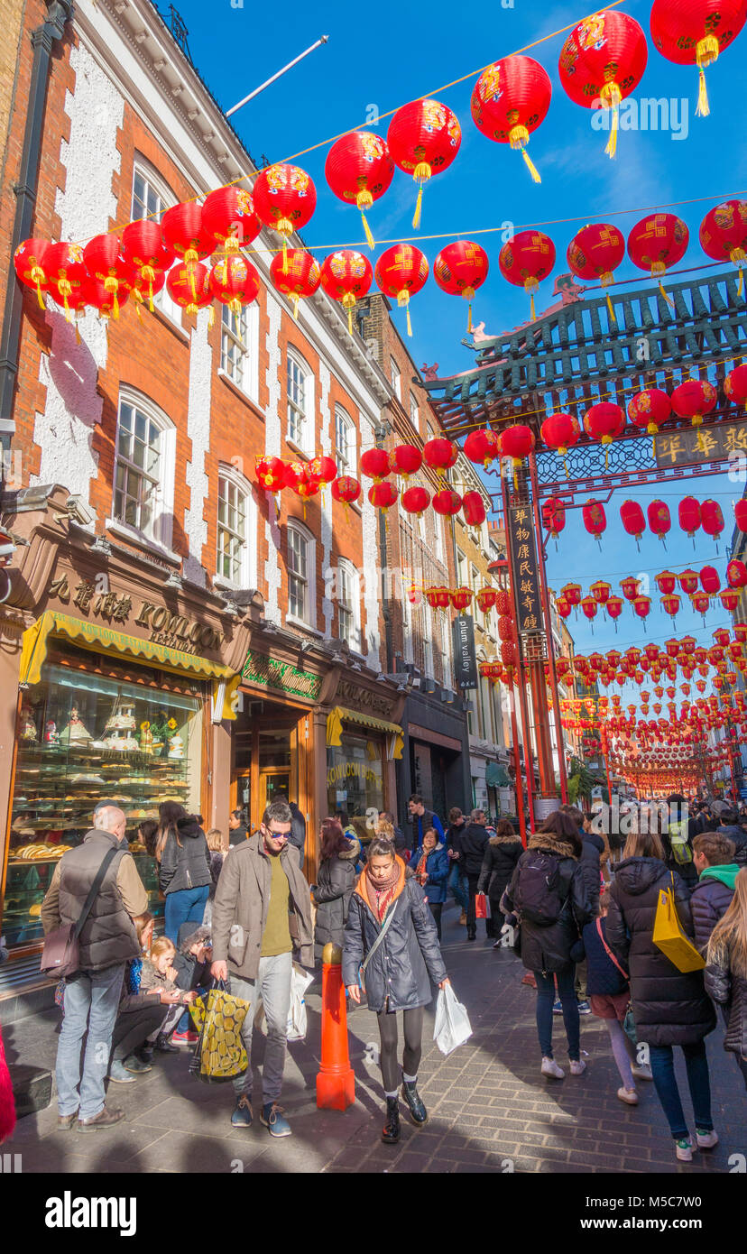 Colourful lanterns and a throng of people in Gerrard Street, Chinatown, to celebrate Chinese New ...