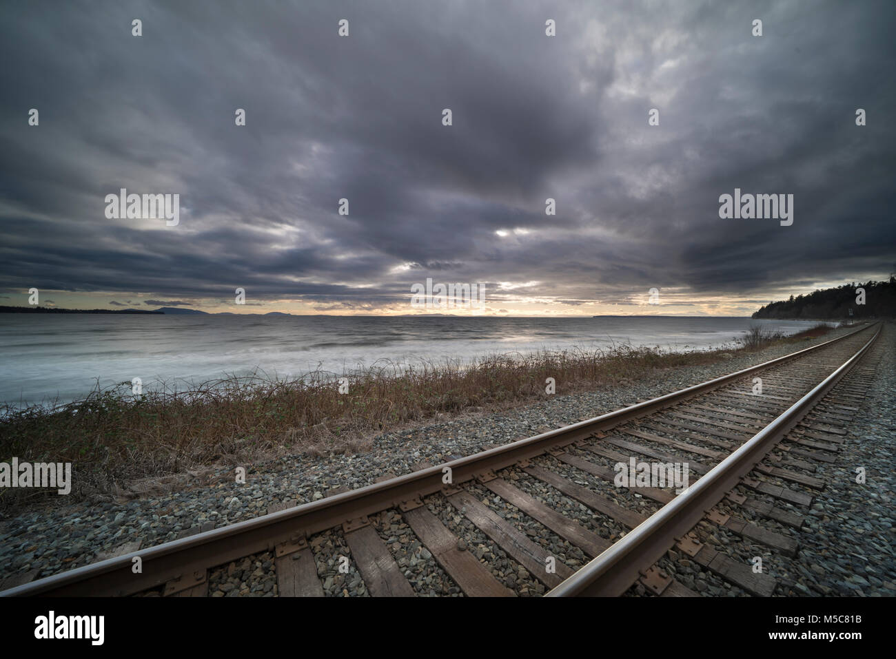 Sun setting after a rainy storm Stock Photo - Alamy