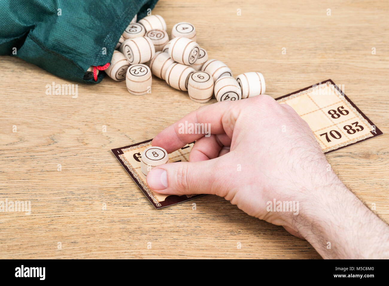 Man playing bingo Stock Photo - Alamy