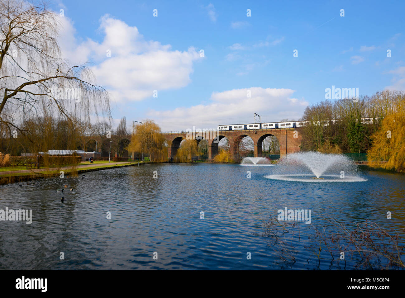 Greater Anglia Abellio electric multiple unit train crossing railway ...