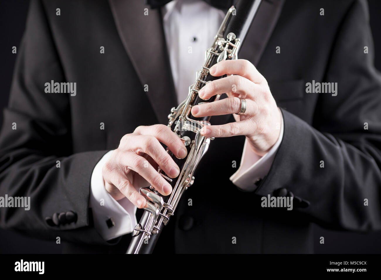 Clarinet player in orchestra hi-res stock photography and images - Alamy