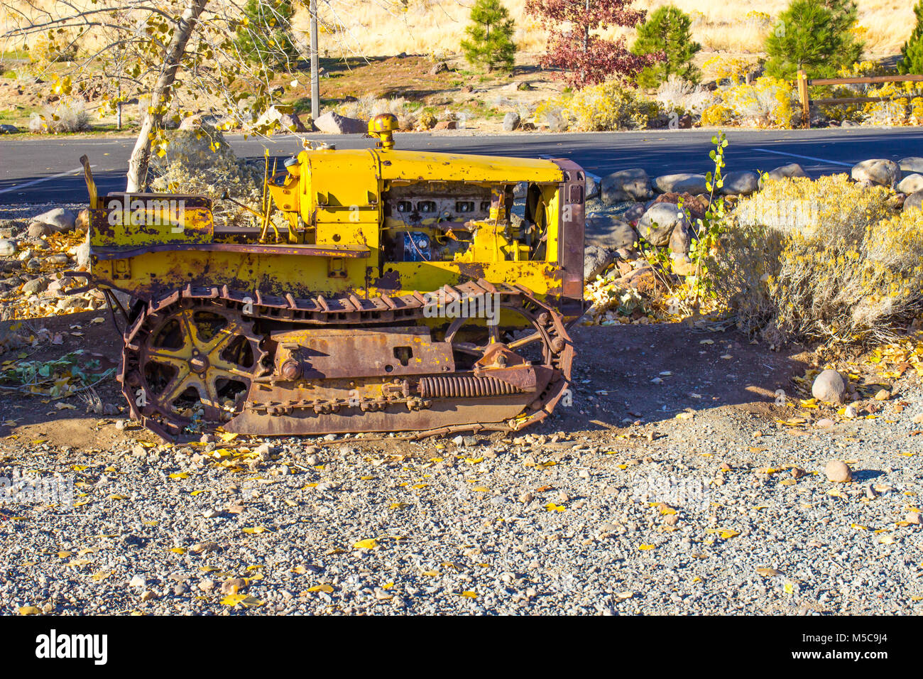 Vintage Yellow Rusty Mini Bulldozer Stock Photo - Alamy