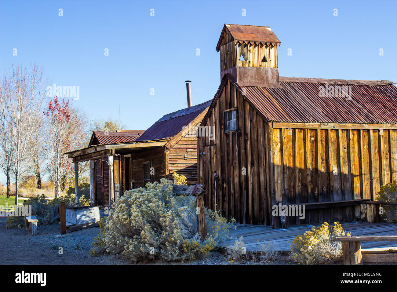 Vintage Wooden Brick Buildings With Wooden Sidewalk Stock Photo - Alamy
