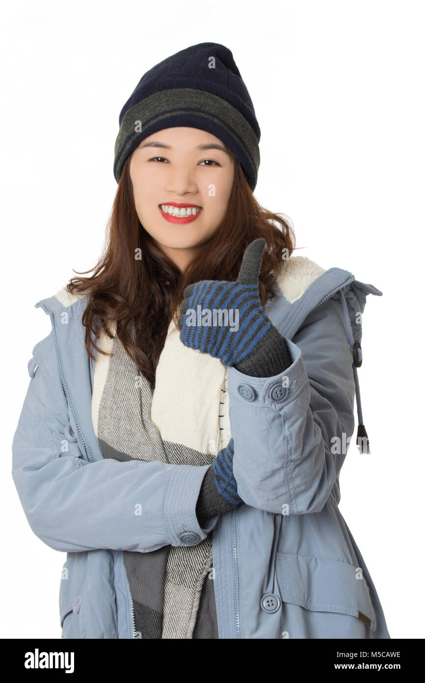 Beautiful Asian woman wearing winter clothes isolated on a white ...