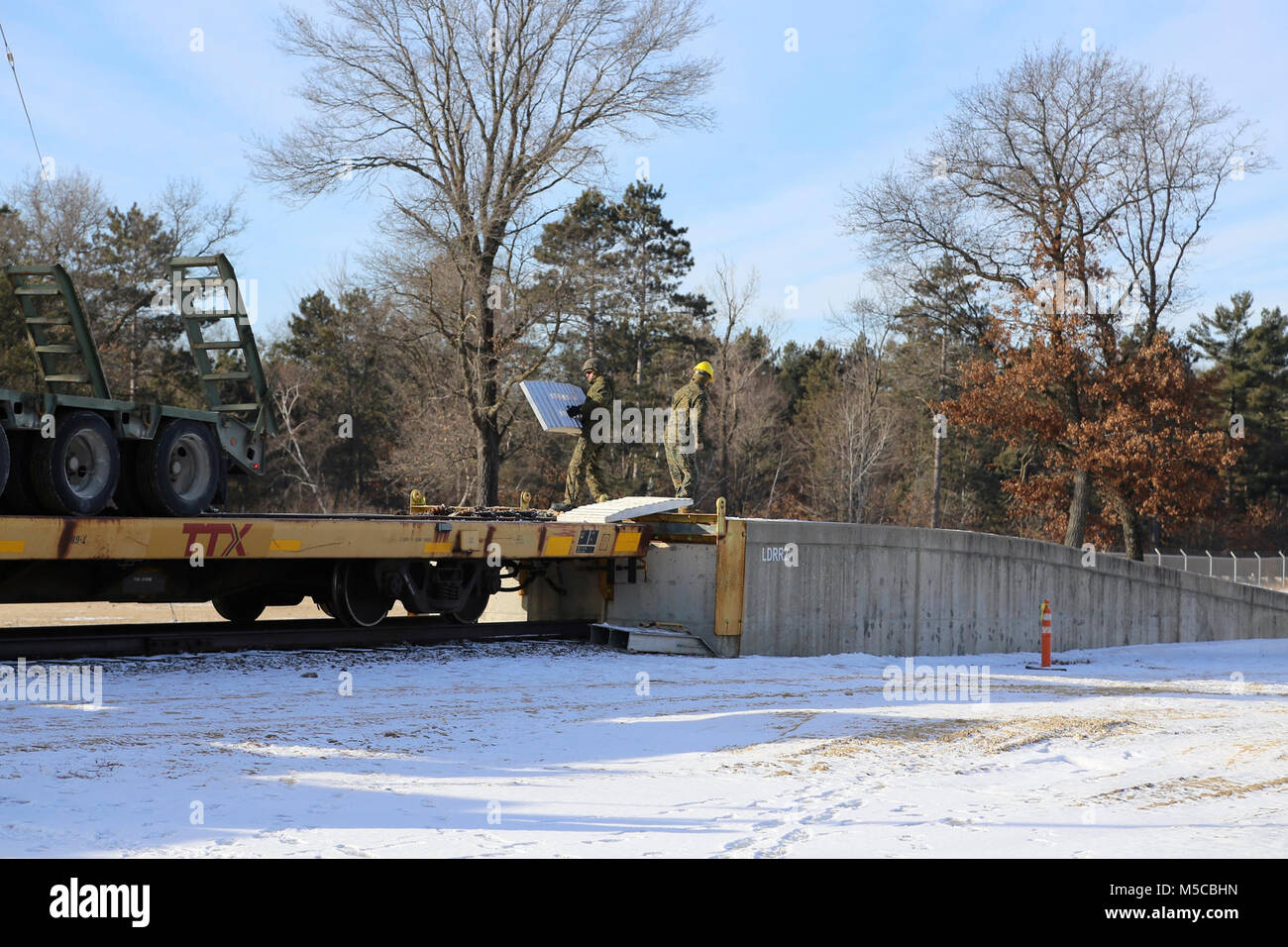 Marines with Marine Wing Support Squadron (MWSS) 271 load equipment on ...