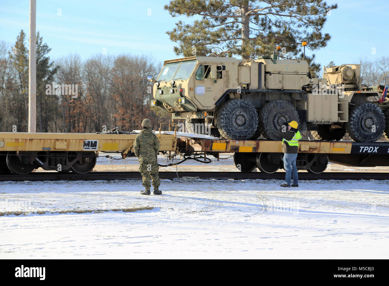 Marines with Marine Wing Support Squadron (MWSS) 271 load equipment on ...