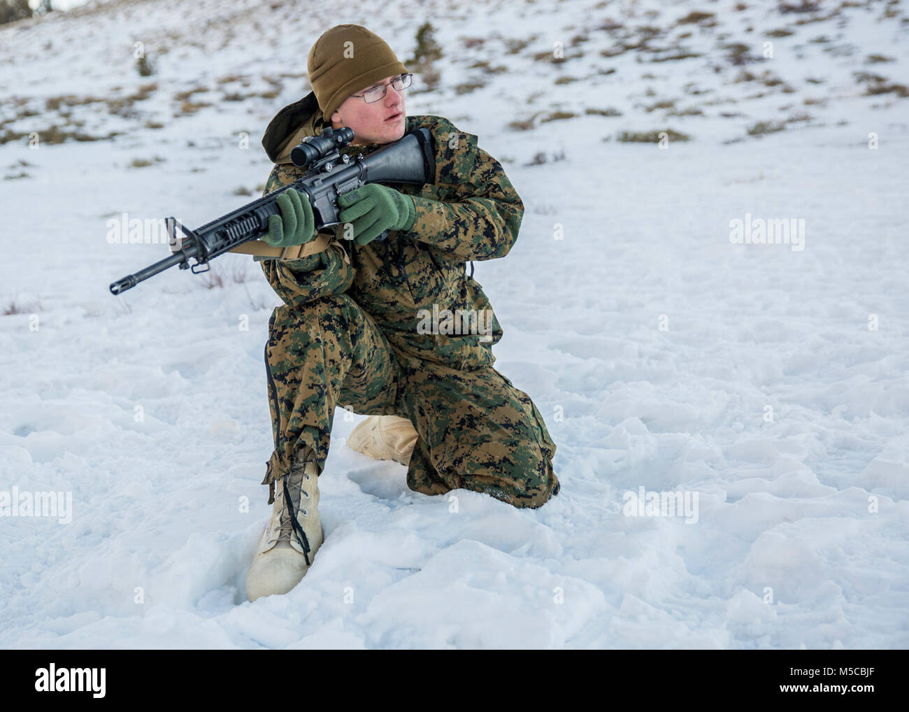 U.S. Marine Corps Lance Cpl. Ian G. Harrison, a tactical transmission ...