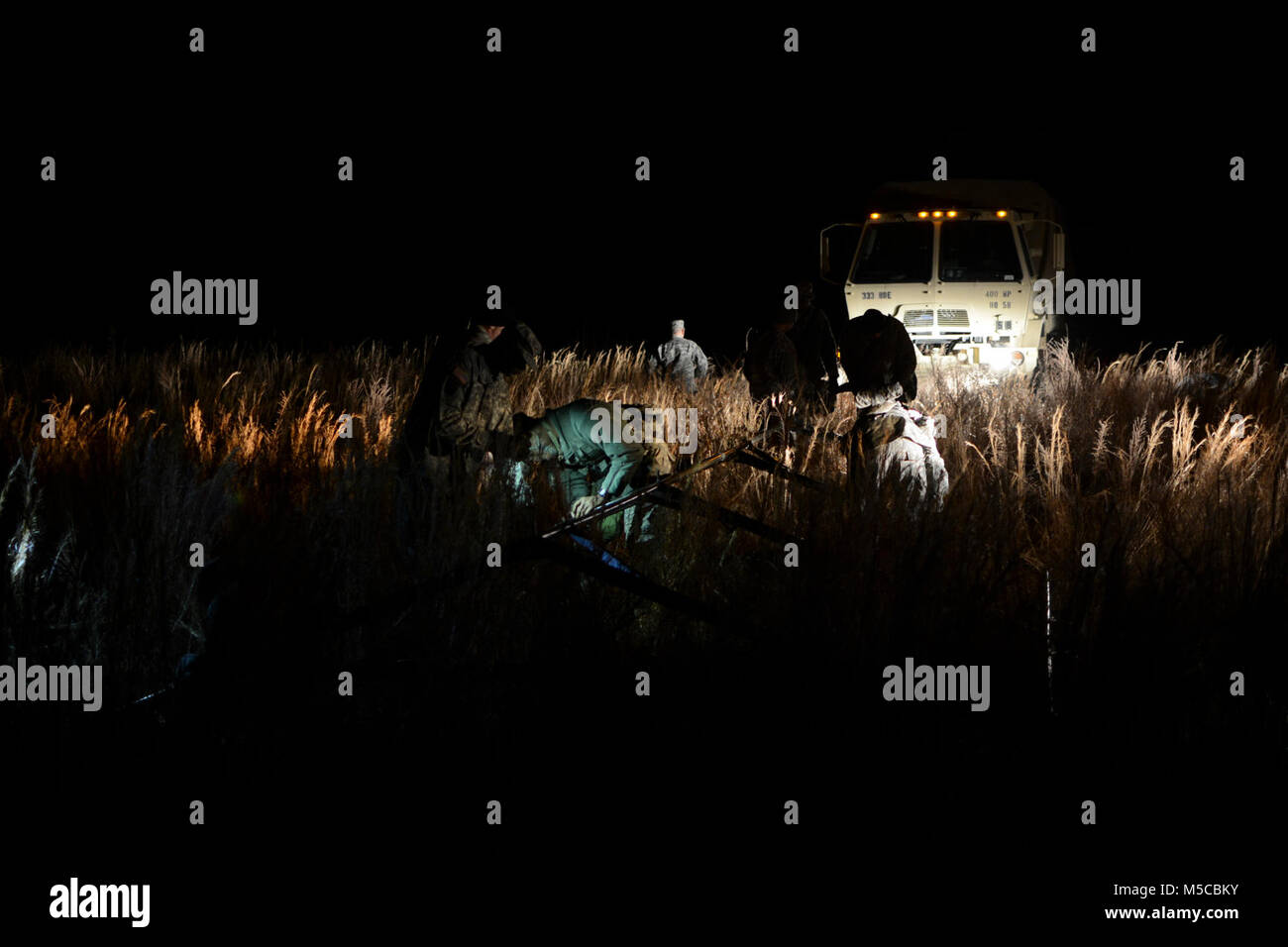 Soldiers of the 55th Sustainment Brigade, race to prepare their tents ...