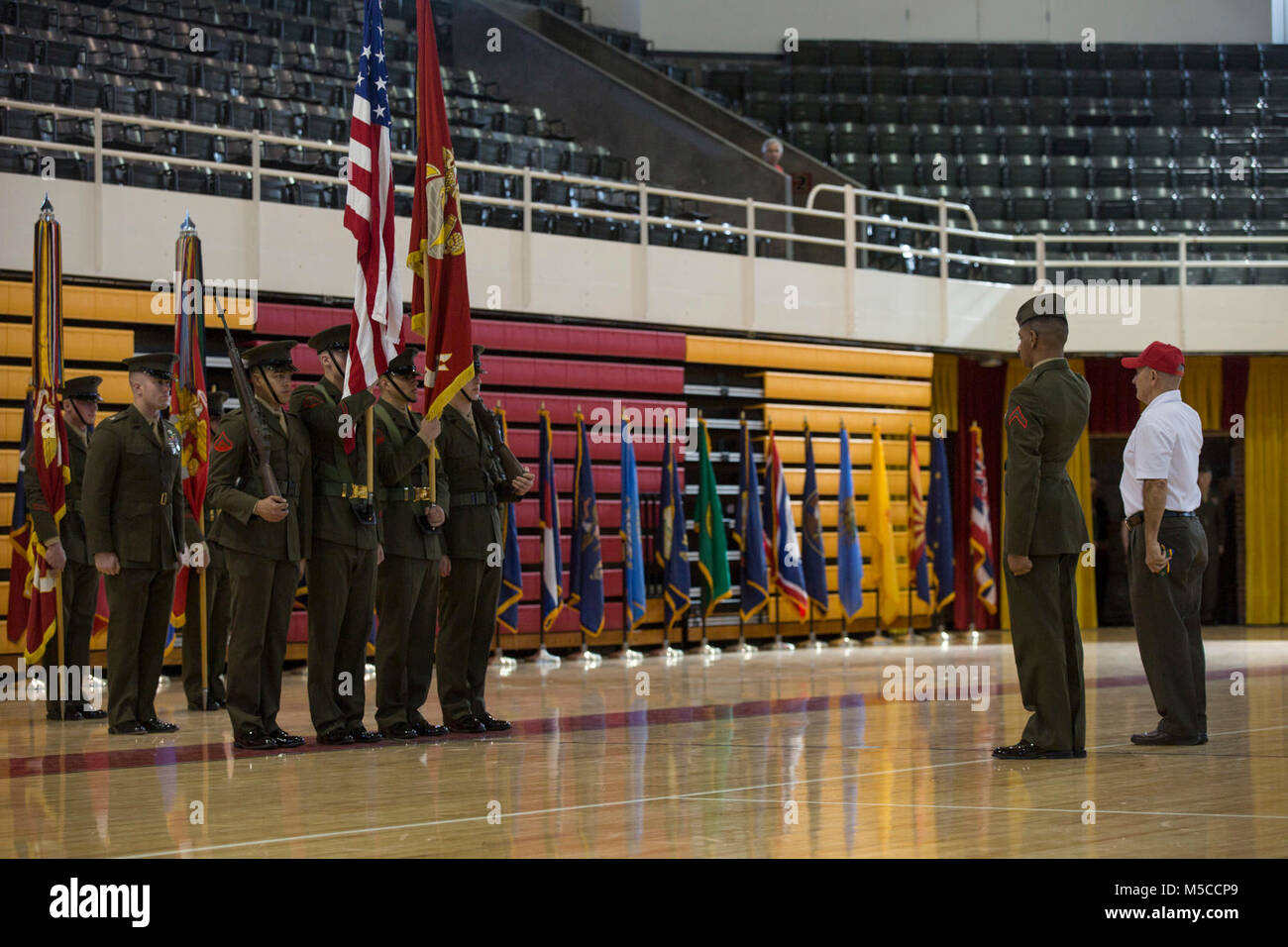 A U.S. Marine with 2nd Marine Division (2d MARDIV), left, and a 2d ...