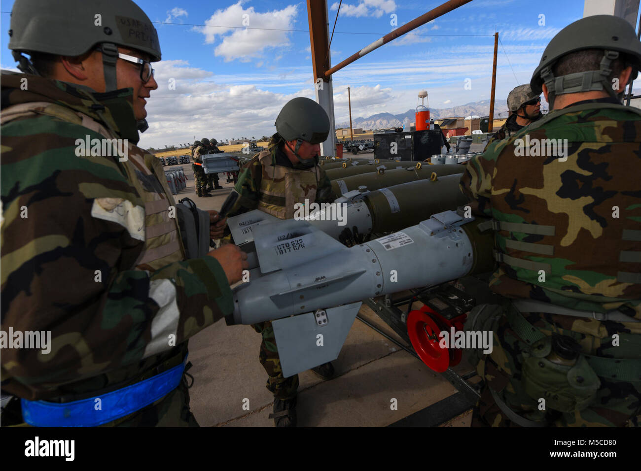 U.S. Airmen from the 355th Equipment Maintenance Squadron's munitions ...