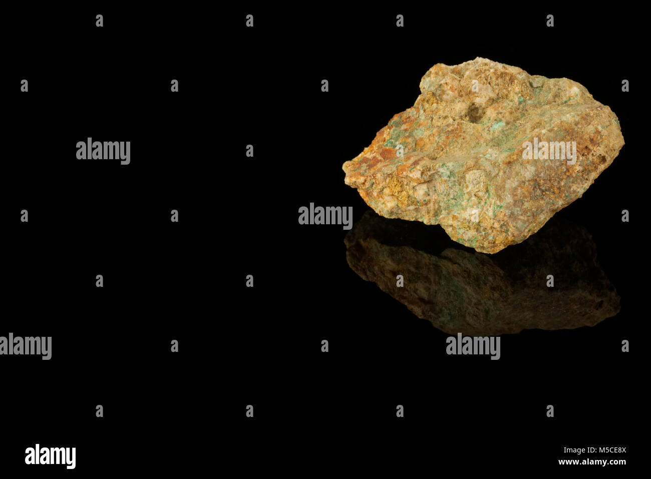 Malachite copper carbonate hydroxide mineral ore isolated on black ...