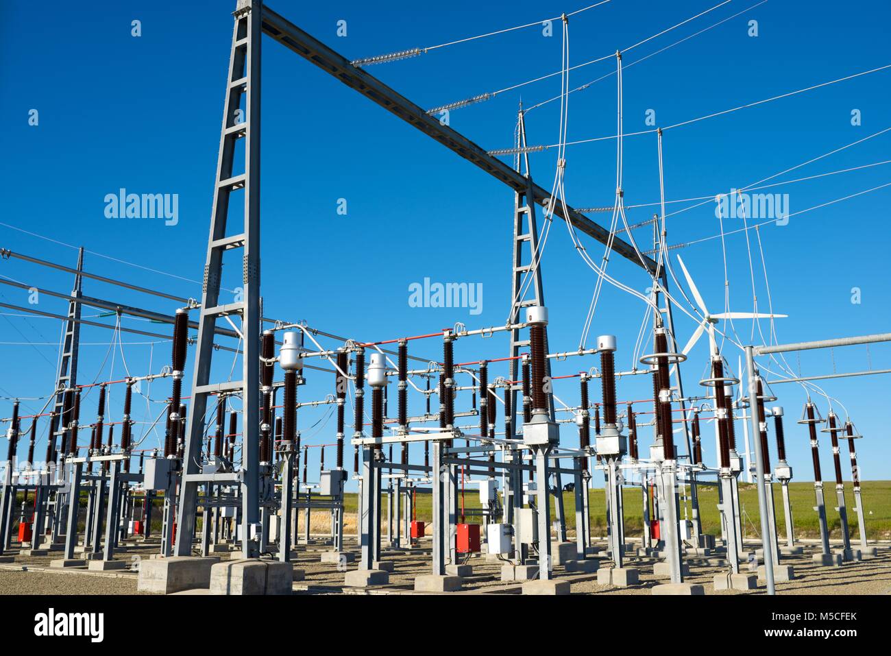 Electrical substation with blue and clear sky Stock Photo - Alamy