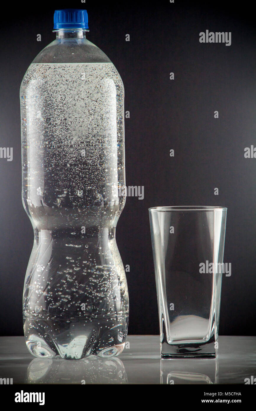 Small water bottle clear drinking cold mineral water Stock Photo - Alamy