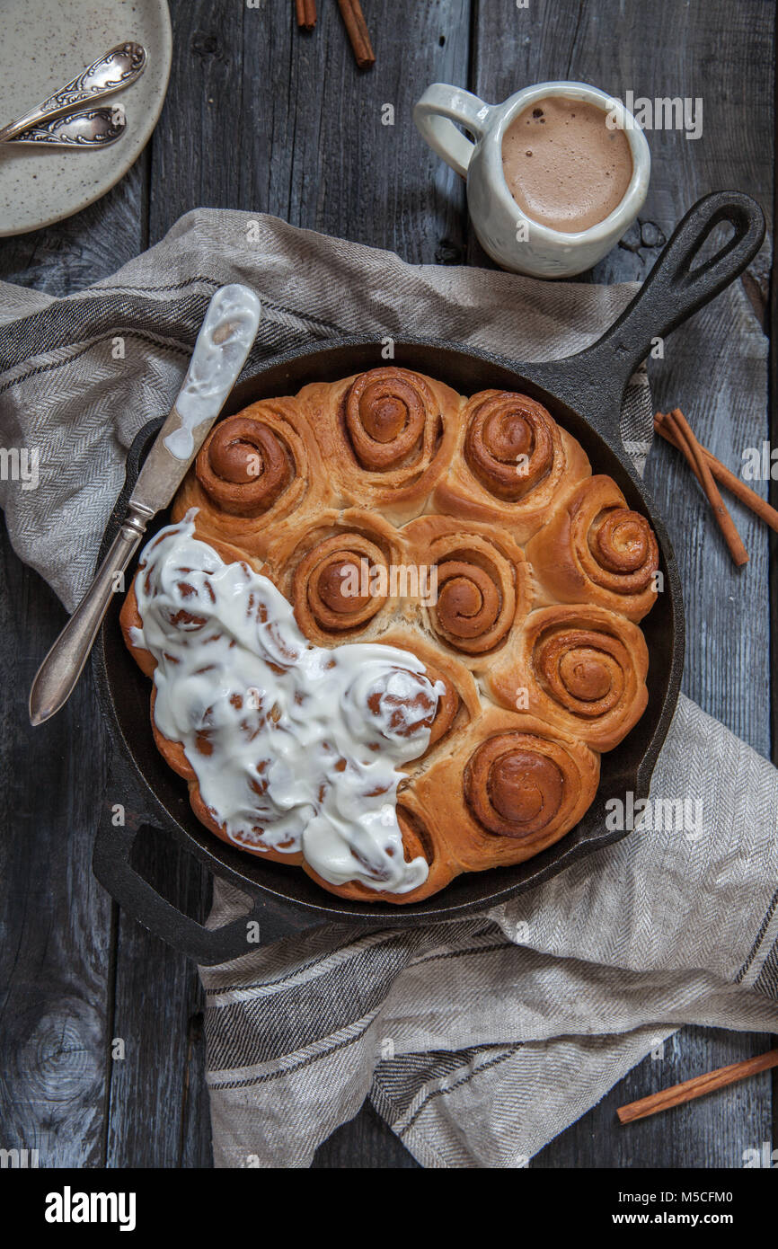 Fresh Homemade Cinnamon Buns Rolls with Cream Cheese Icing Stock Photo ...