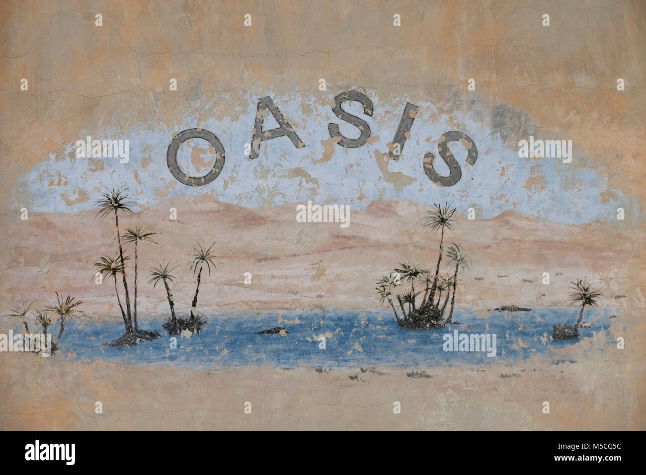Graffiti with the word Oasis painted on abandoned structure near Kalia ...