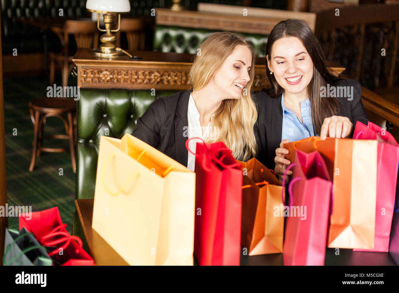 Beautiful young girls are happy after shopping day in holidays Stock ...