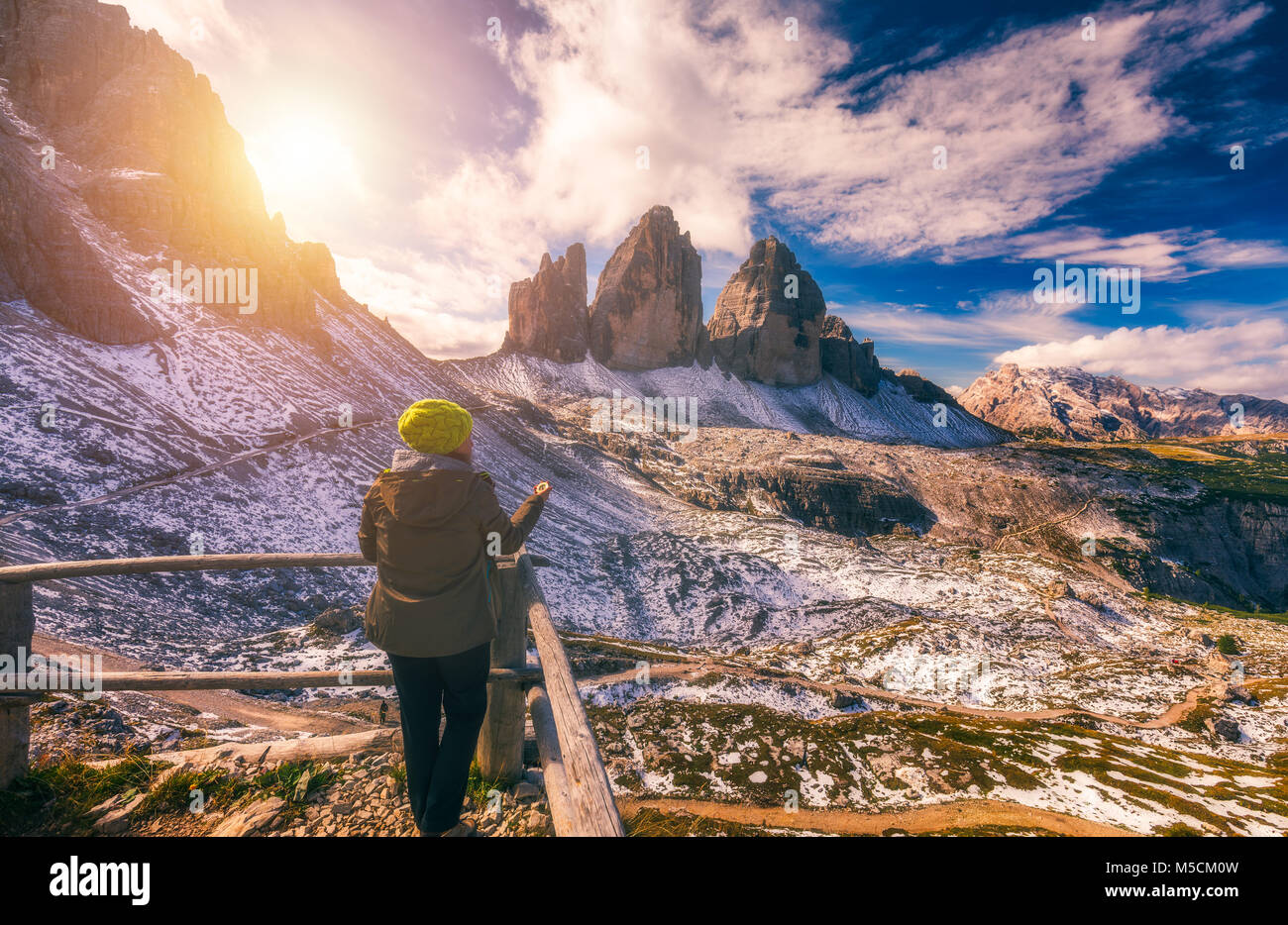 Explorer searching direction with compass in summer mountains, point of ...