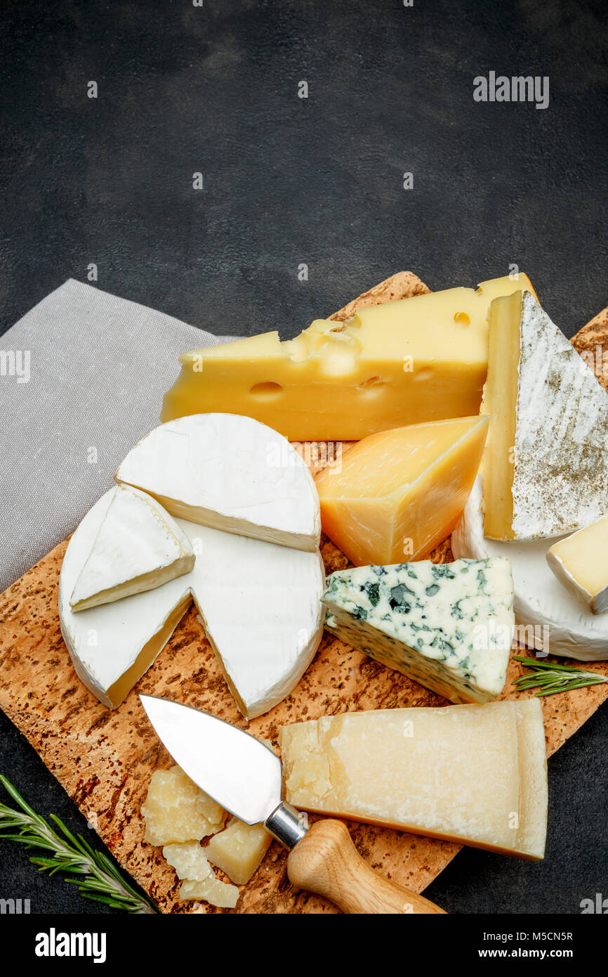 Various types of cheese - parmesan, brie, roquefort, cheddar Stock ...