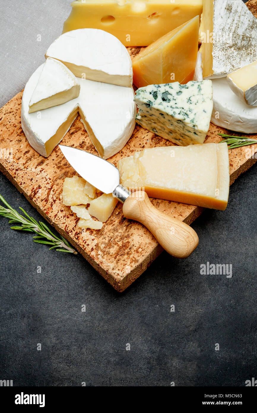 Various types of cheese - parmesan, brie, roquefort, cheddar Stock ...