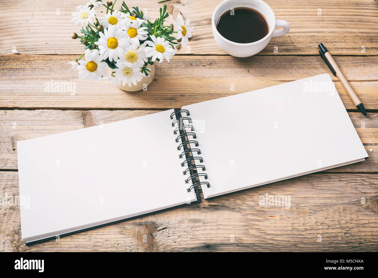 Blank empty notebook, wooden background, view from above, space for ...