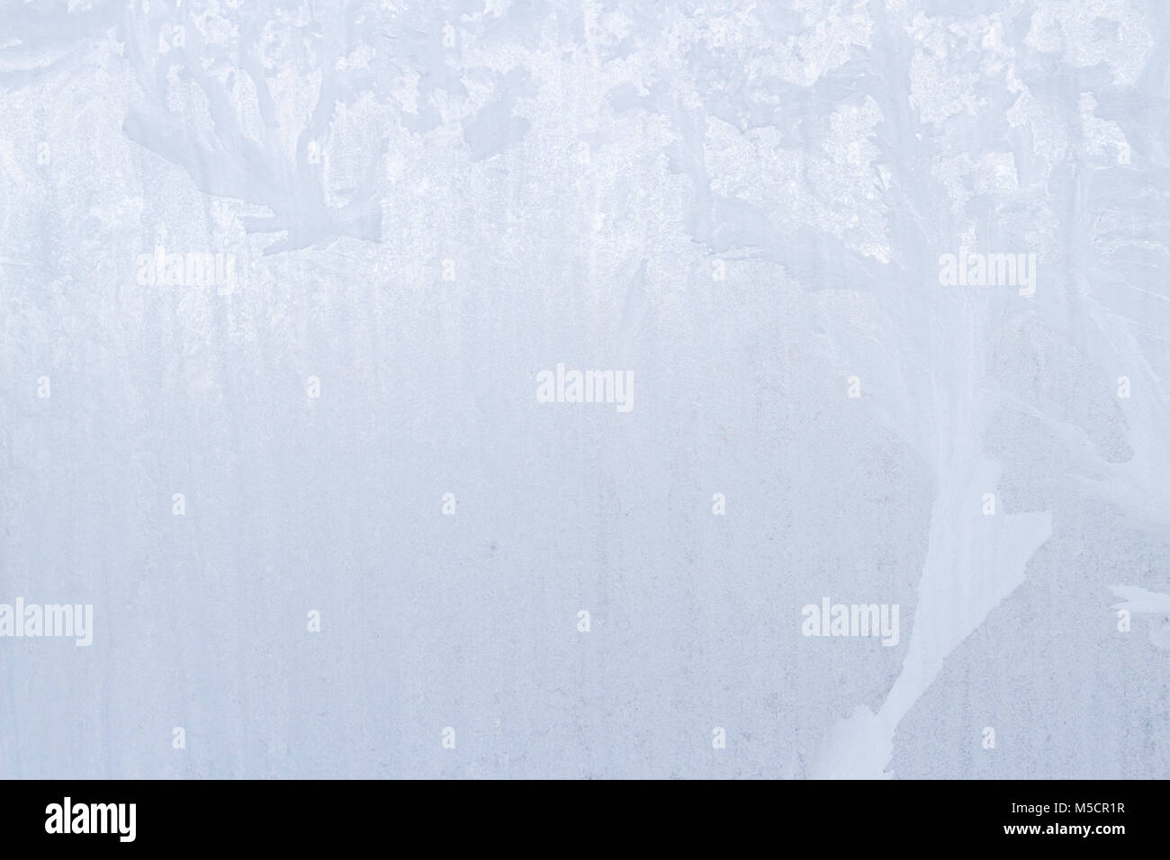 Winter frosty patterns on the frozen ice window Stock Photo - Alamy