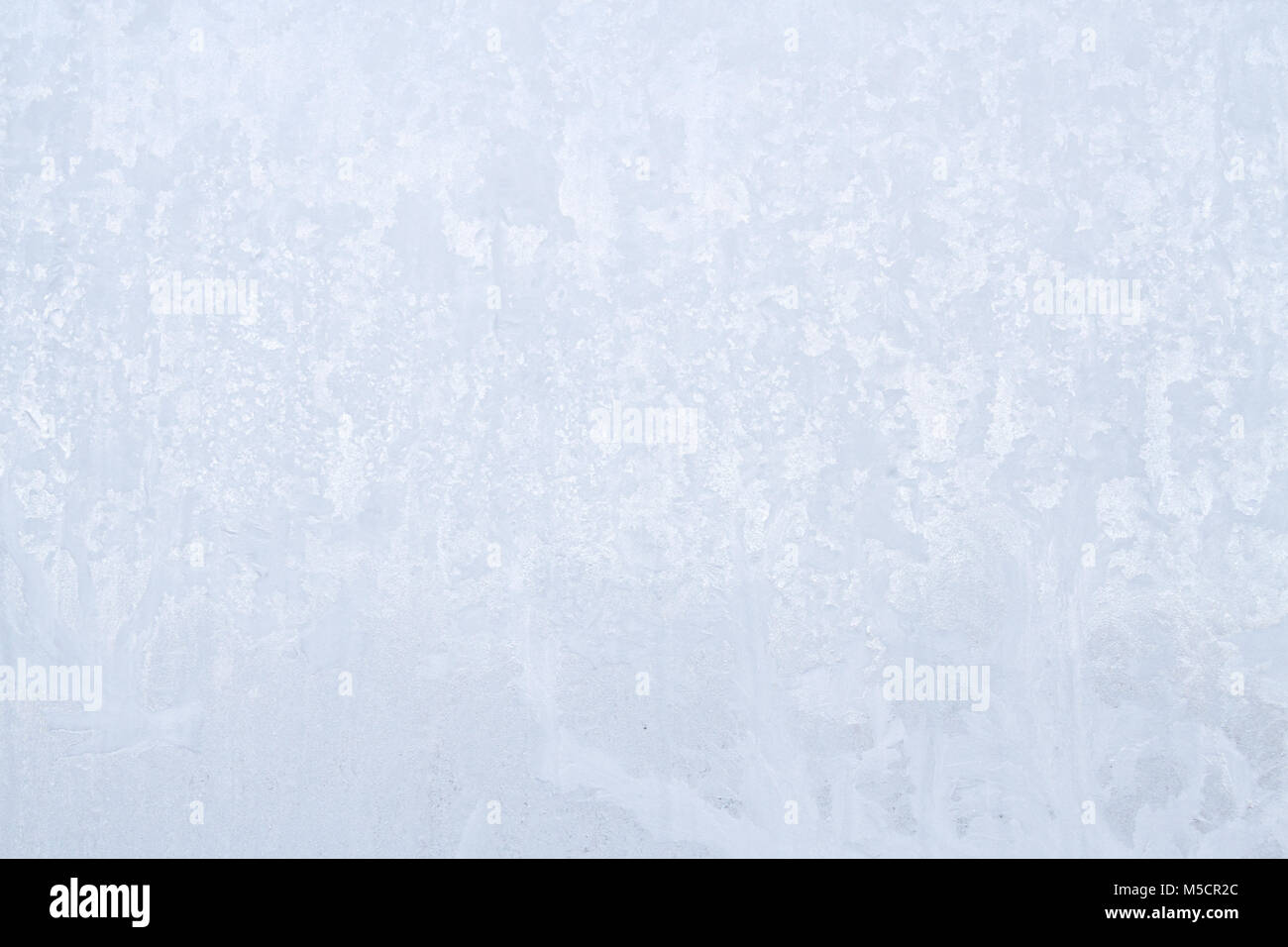 Winter frosty patterns on the frozen ice window Stock Photo - Alamy